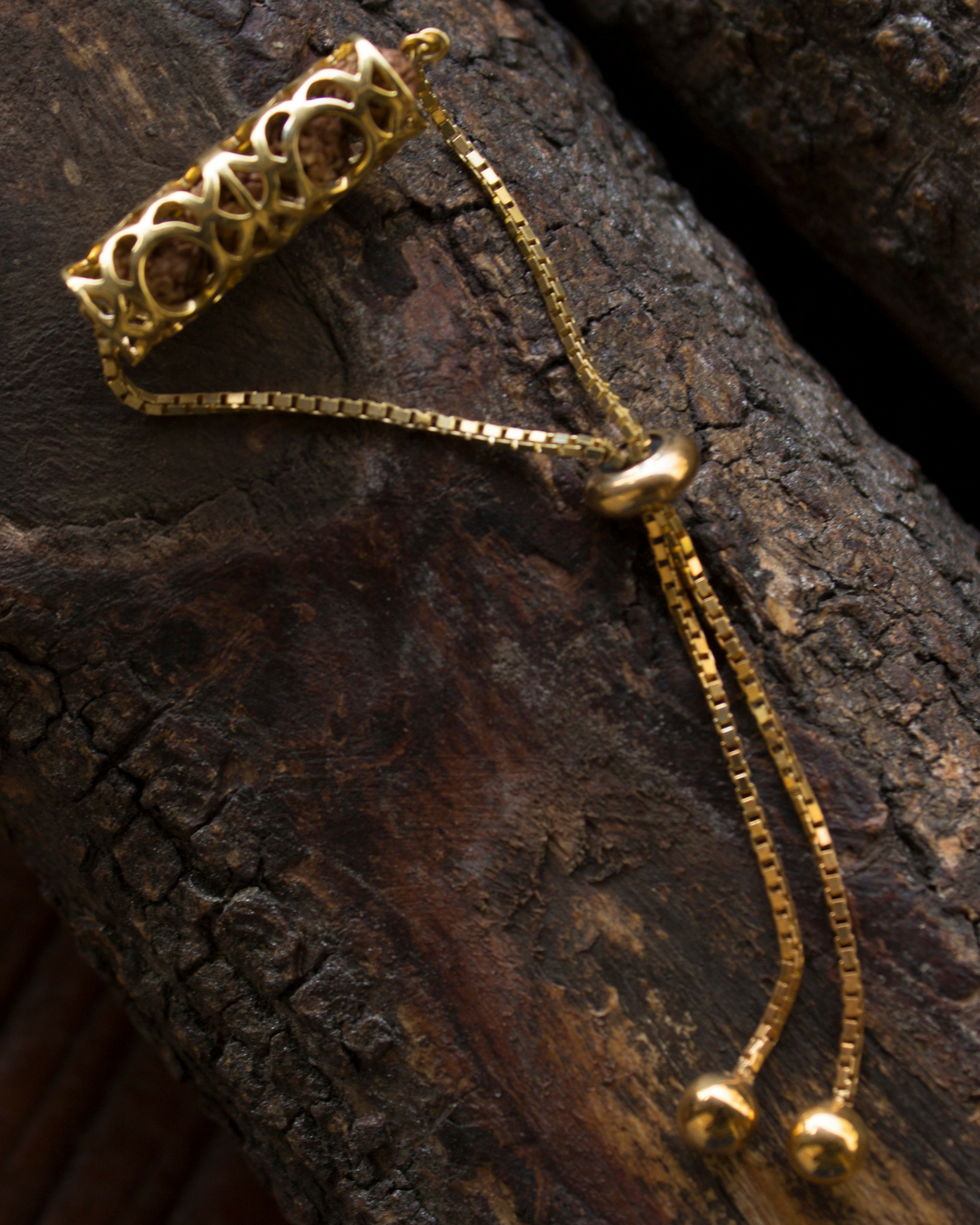 Gold infinity loop bracelet by My East | The Secret Label