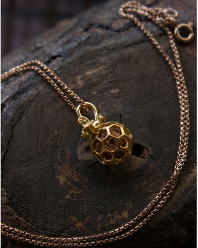 Gold hive pendant by My East | The Secret Label