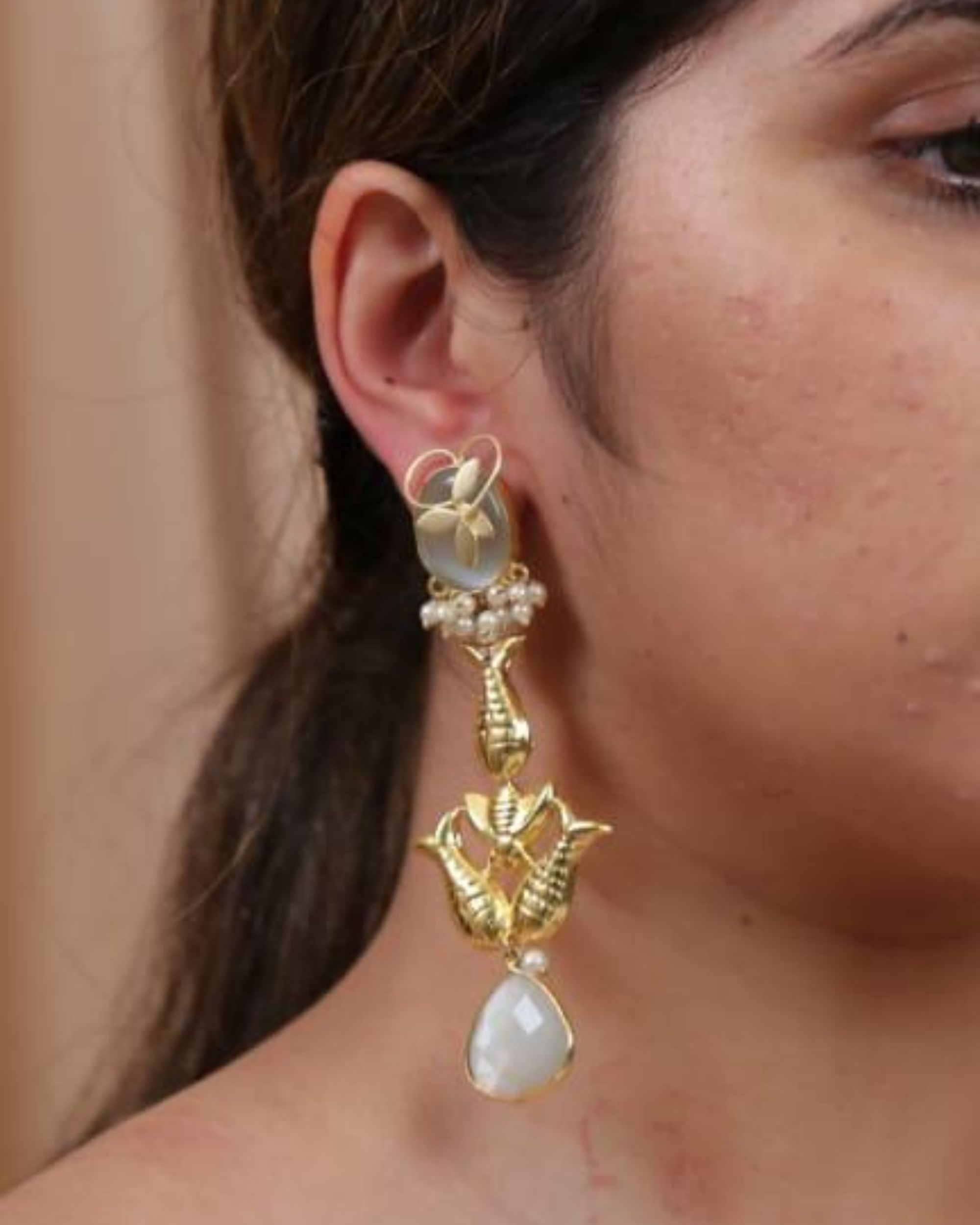 Milky white stone fish motif earring by A Line | The Secret Label