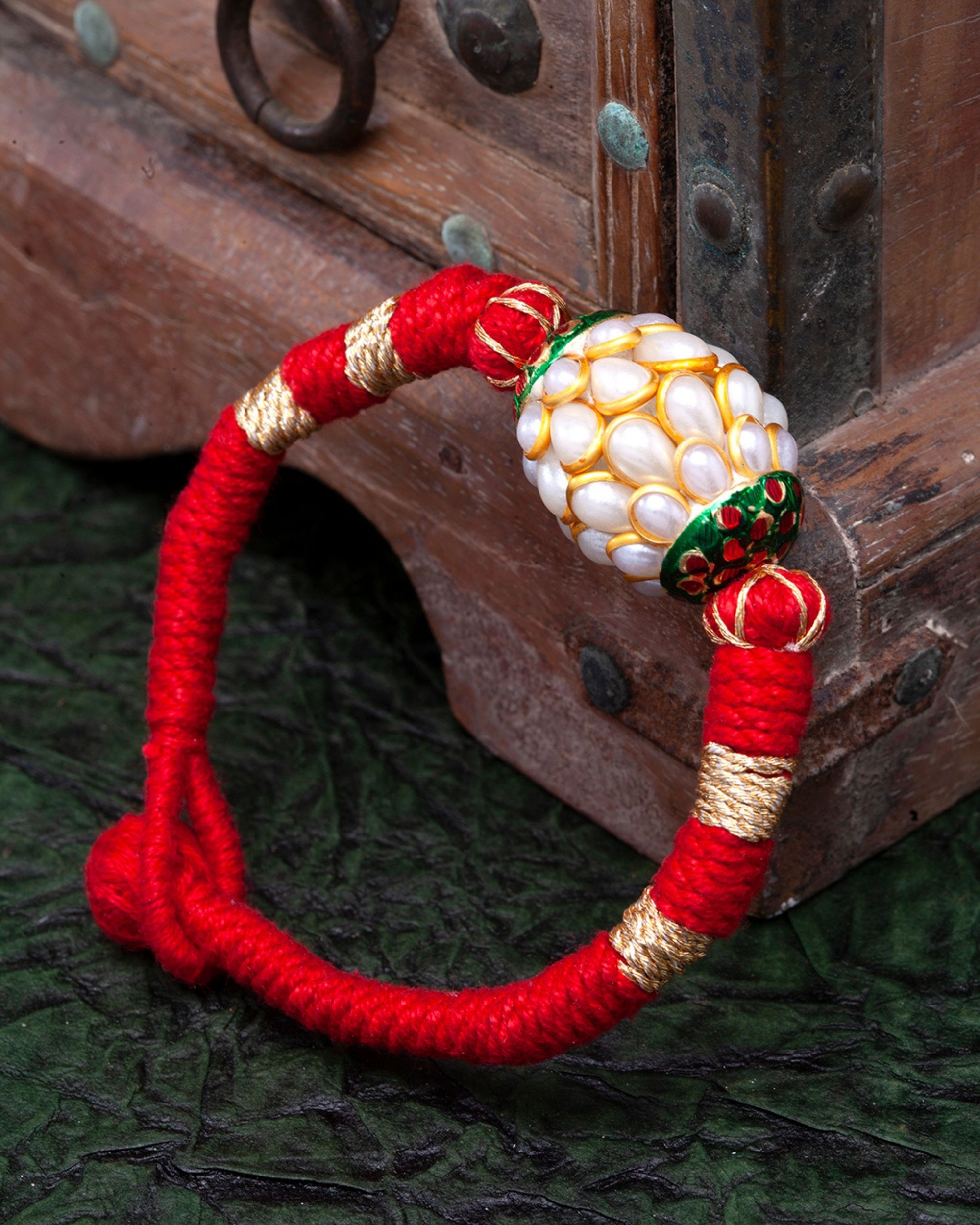 Red thread work pearl beaded bracelet by Dugri Style | The Secret Label