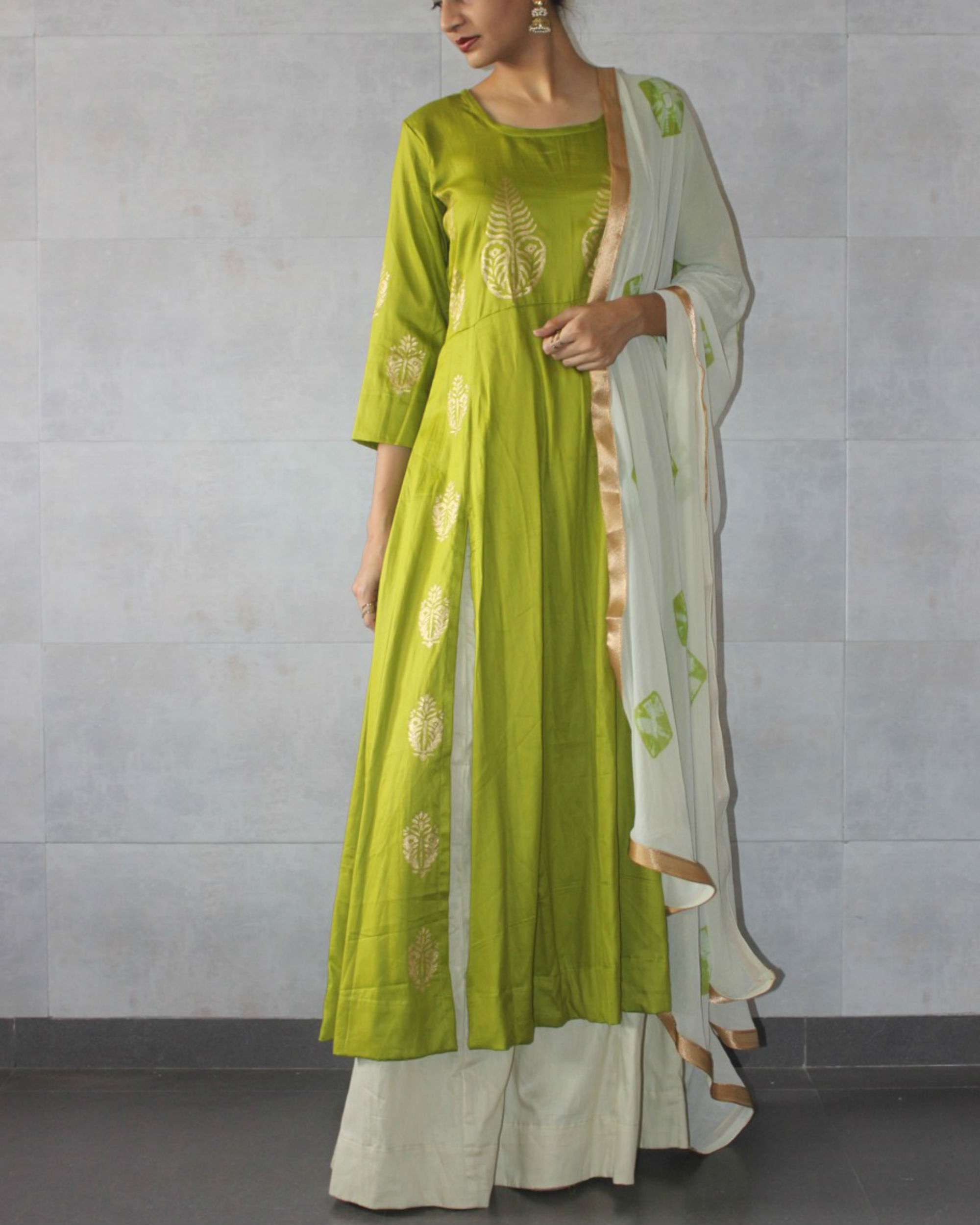 Green side slit kurta set with dupatta by The Label Studio | The Secret ...