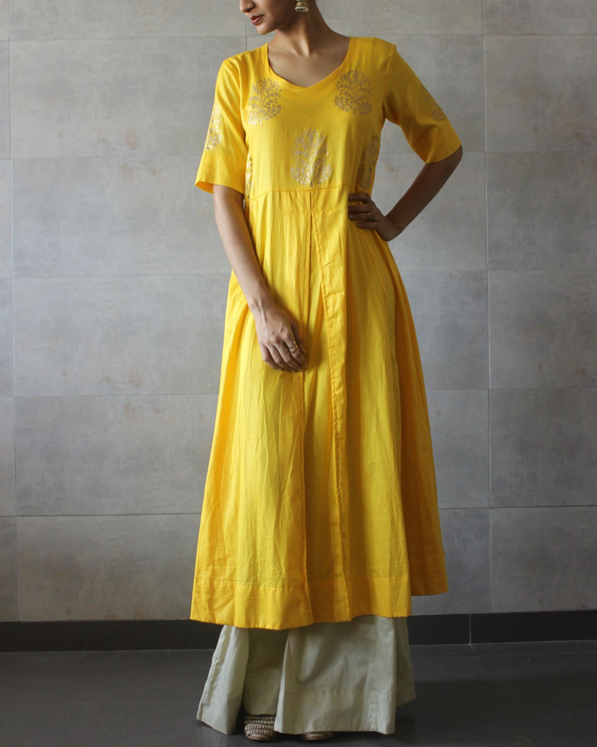 Yellow box pleated kurta by The Label Studio | The Secret Label