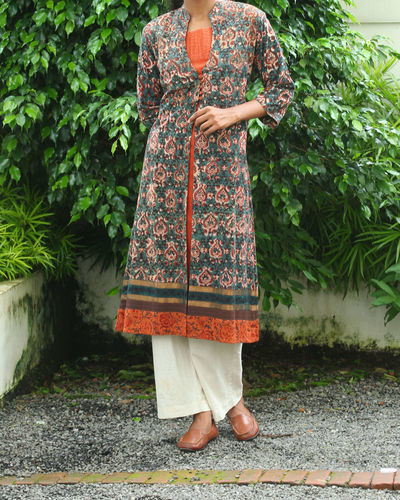 Orange urti with jade green overcoat by Mantra | The Secret Label