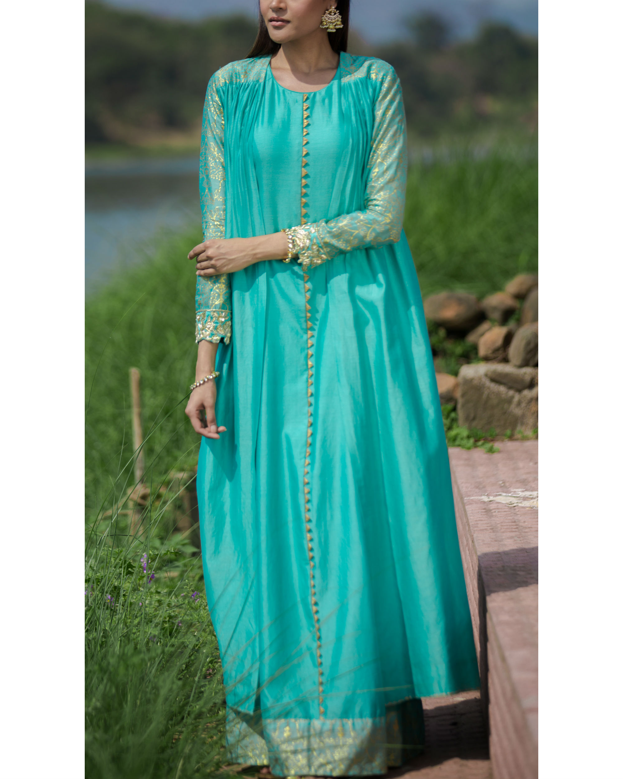 Aqua blue pleated jacketdress by Drishti and Zahabia | The Secret Label