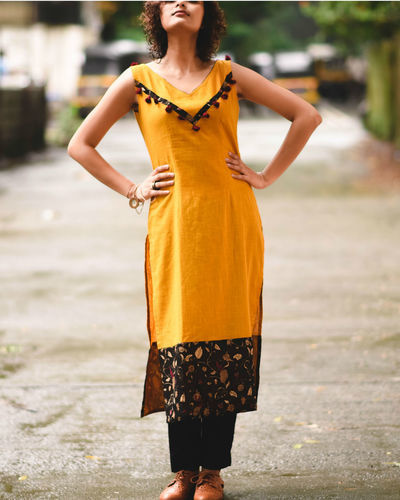 Mustards and tassels by Suta | The Secret Label