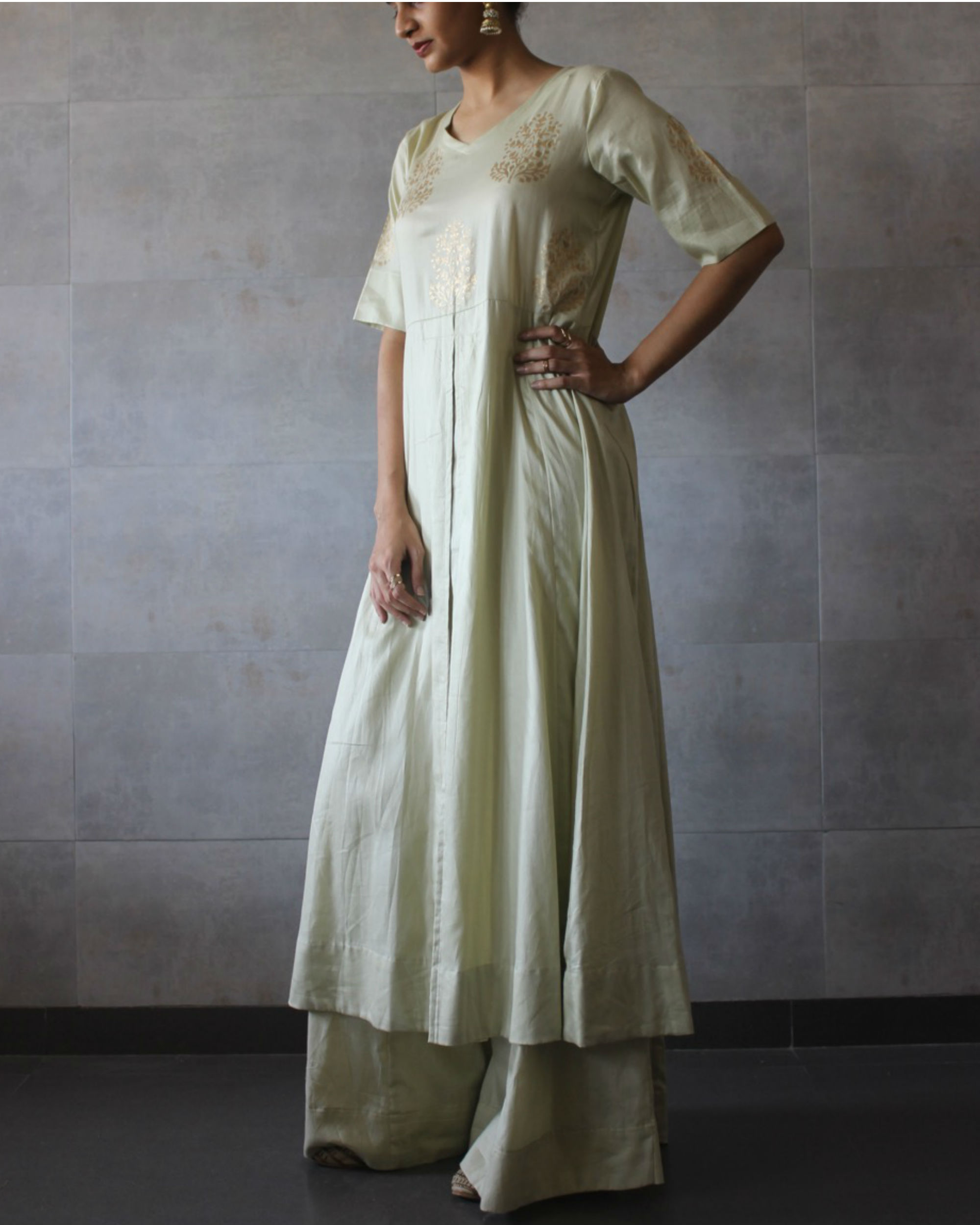 Ivory box pleated kurta by The Label Studio | The Secret Label
