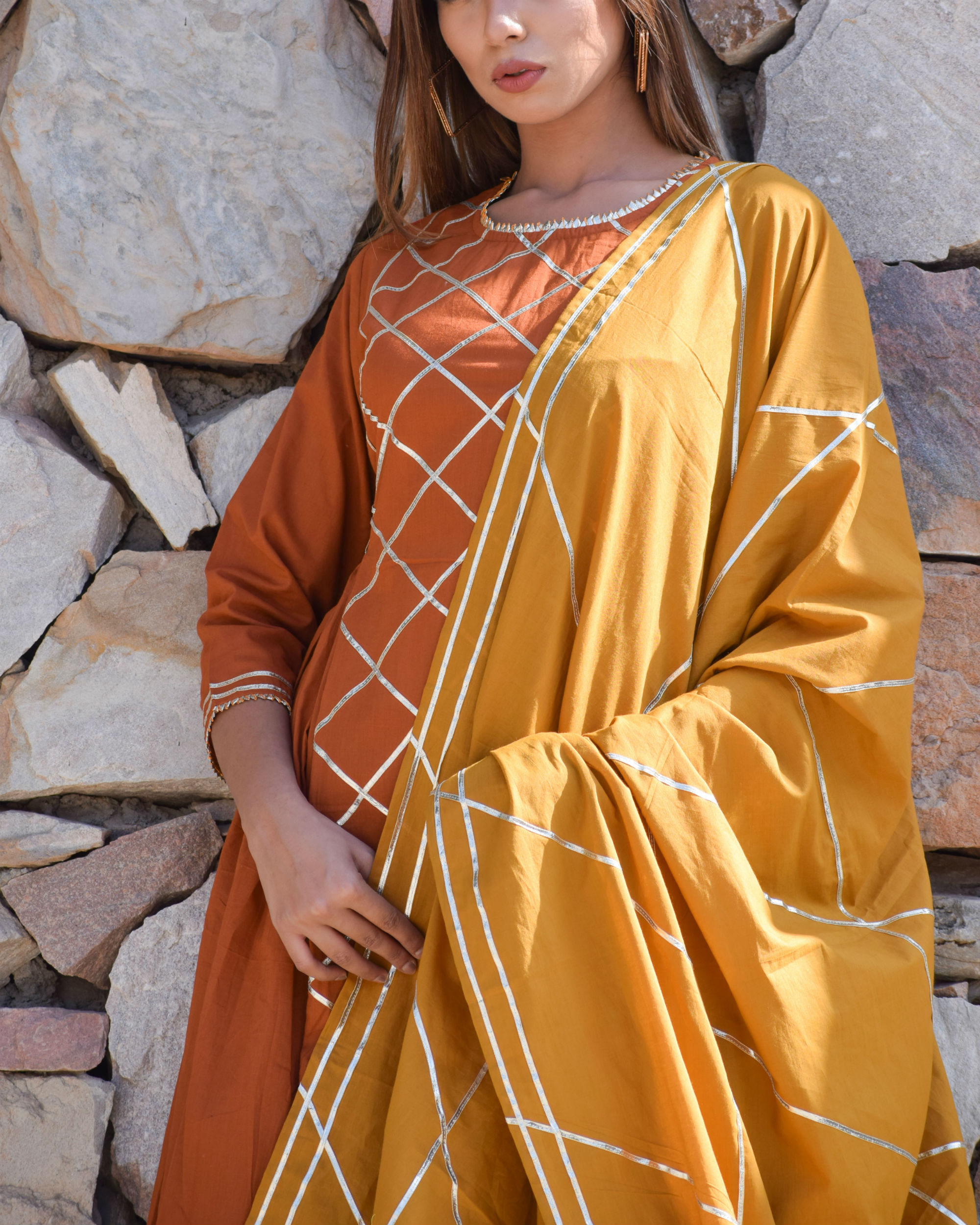 Rust side pleated kurta set with mustard dupatta by Chokhi Bandhani | The Secret Label