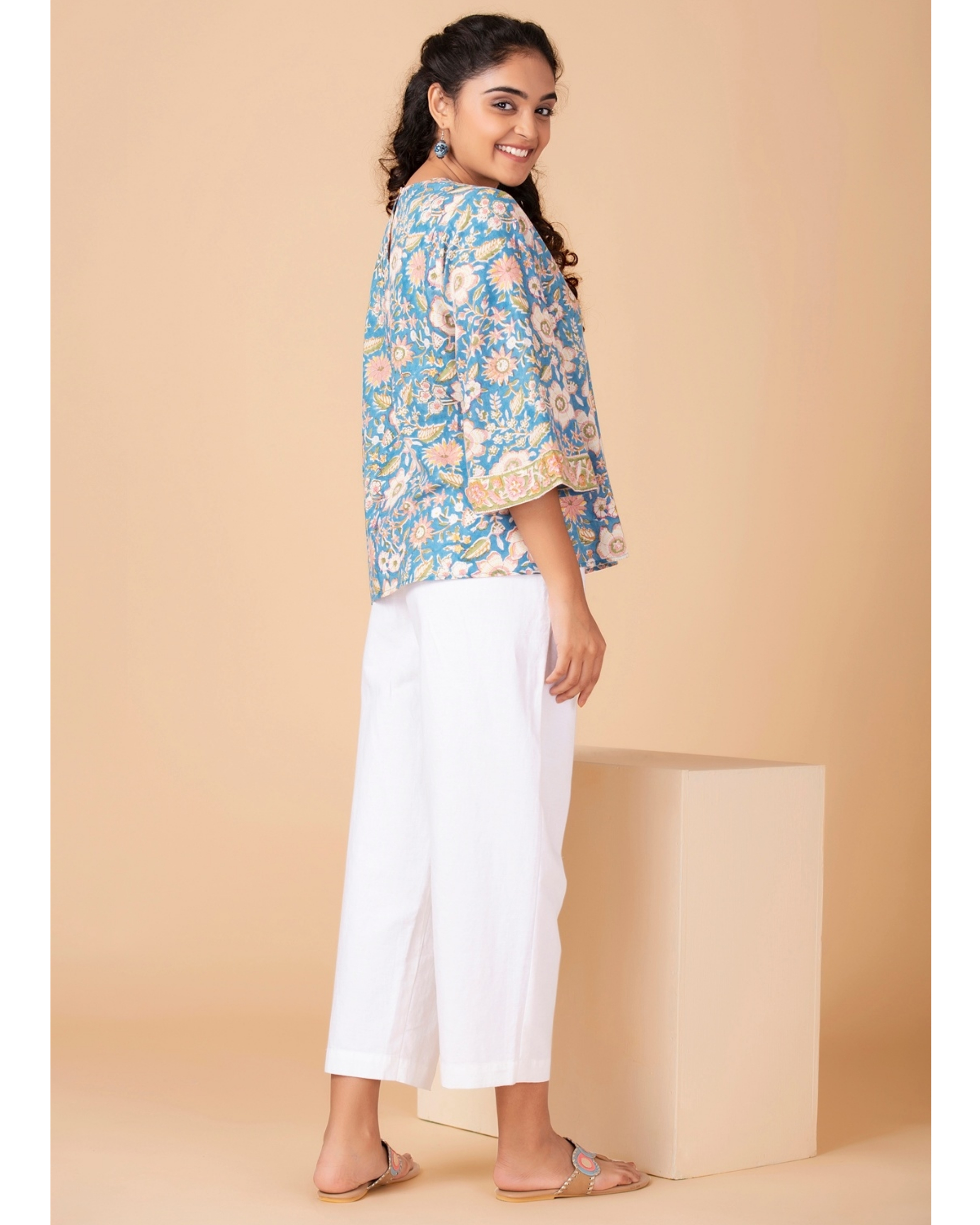 Aqua blue floral printed top by Twirl Studio | The Secret Label