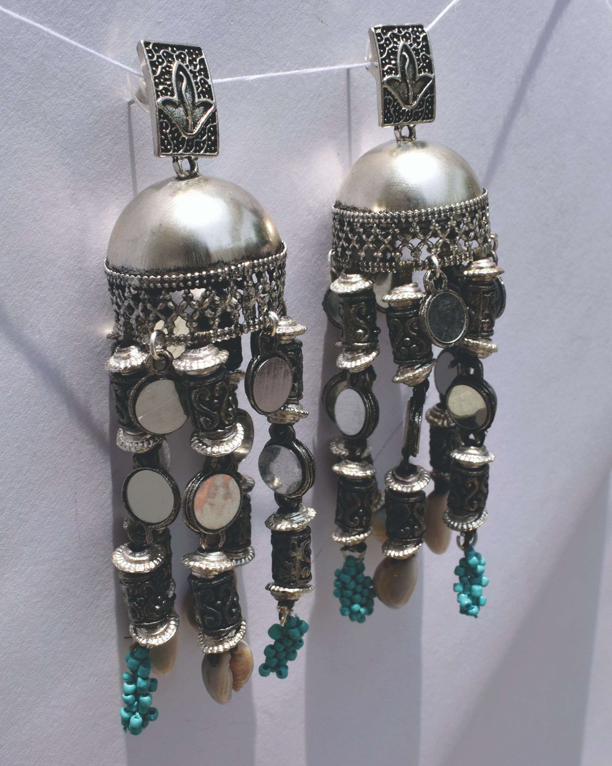 Cowrie shells beaded jhumkas by Nakhrewaali | The Secret Label