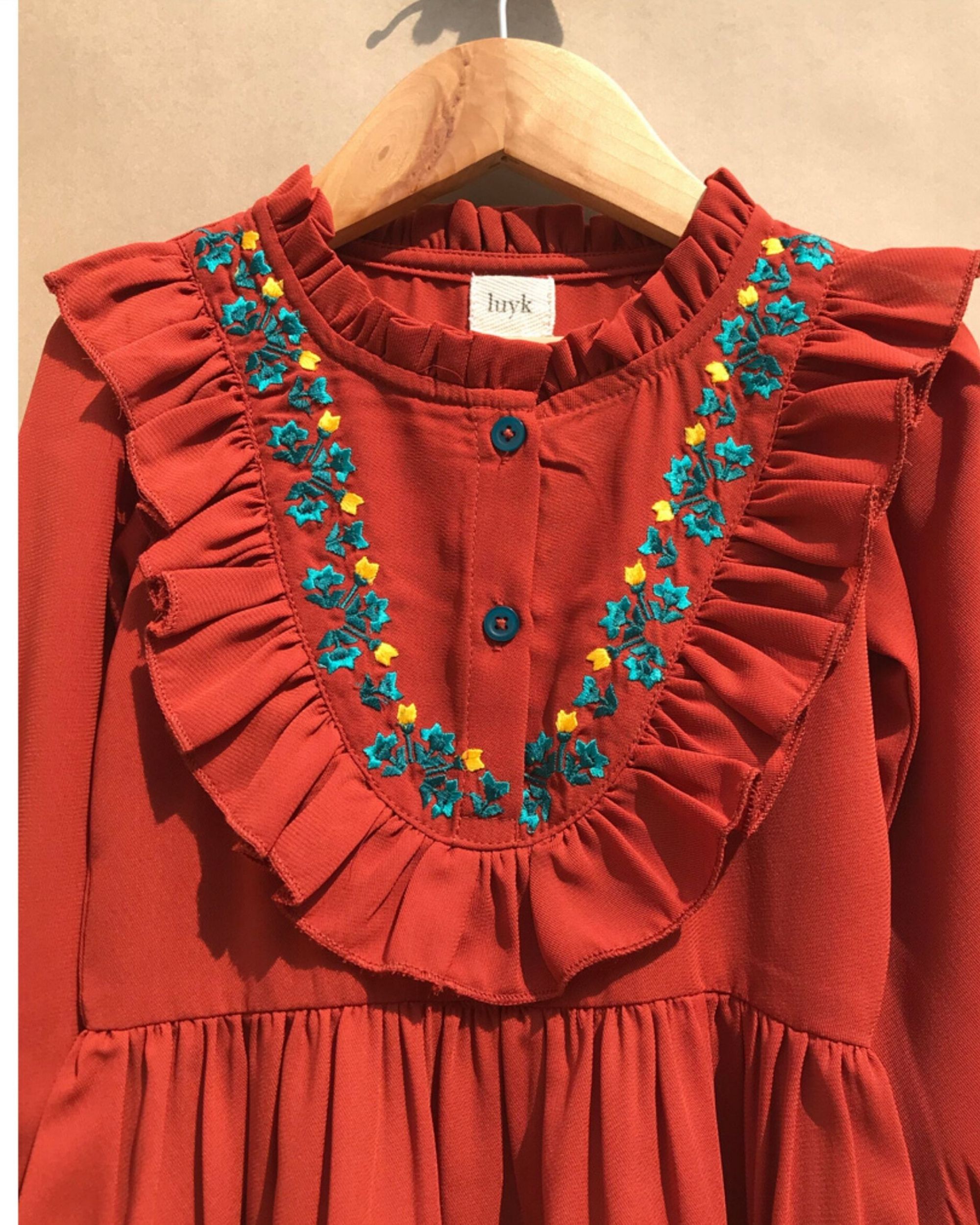 Rust embroidered skater dress by Luyk | The Secret Label