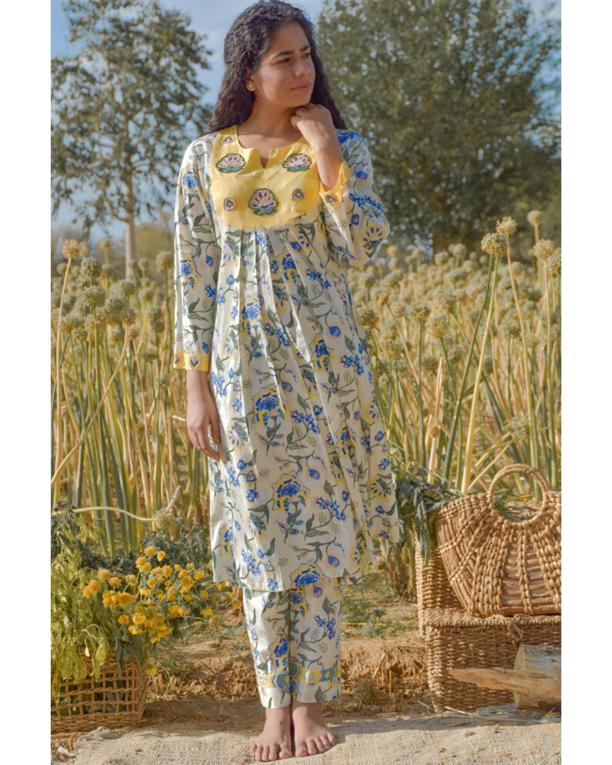 White floral box pleated yoke kurta by BAISE GABA | The Secret Label