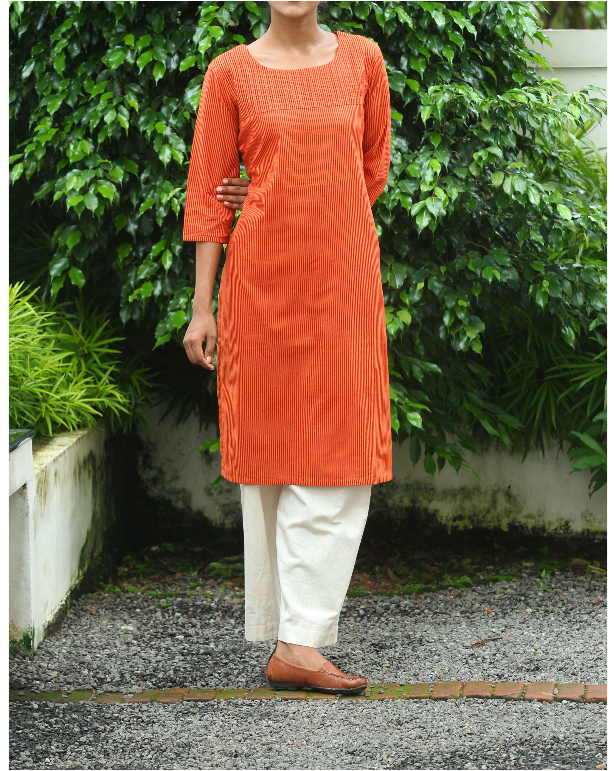 Orange urti with jade green overcoat by Mantra | The Secret Label
