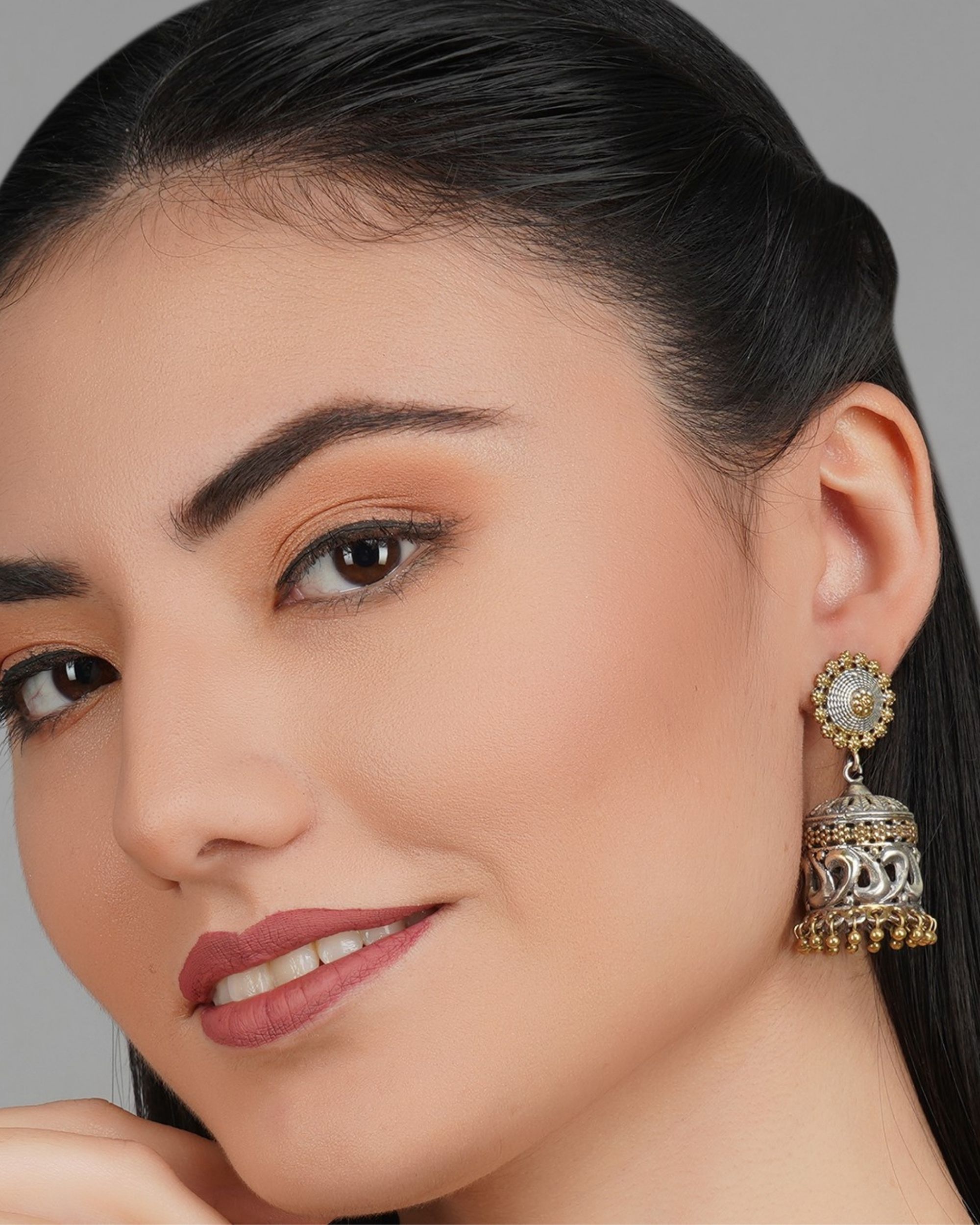 Floral and leaf designed round jhumka by Studio B 40 | The Secret Label