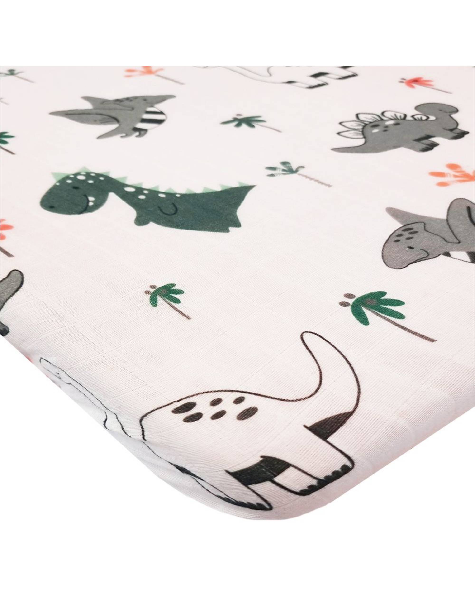 Dino-themed fitted cot sheet by Little By Little | The Secret Label